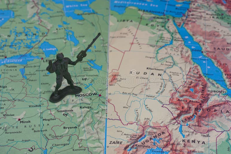 Toy soldier above the map stock photo. Image of global - 22986216