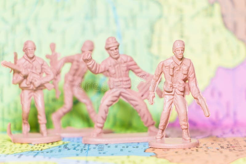 Toy Soldiers on Paper Map Background Stock Image - Image of childhood ...