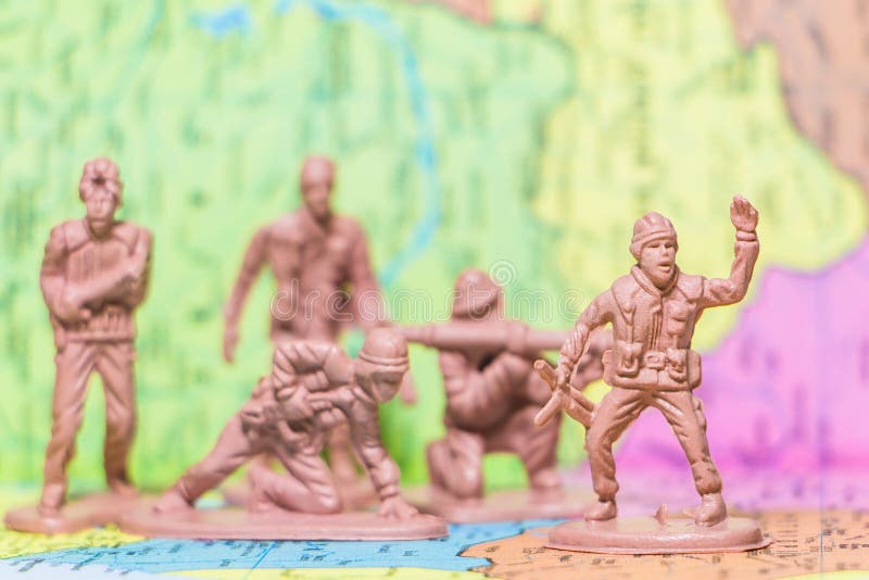 Toy Soldiers on Paper Map Background Stock Image - Image of warfare ...