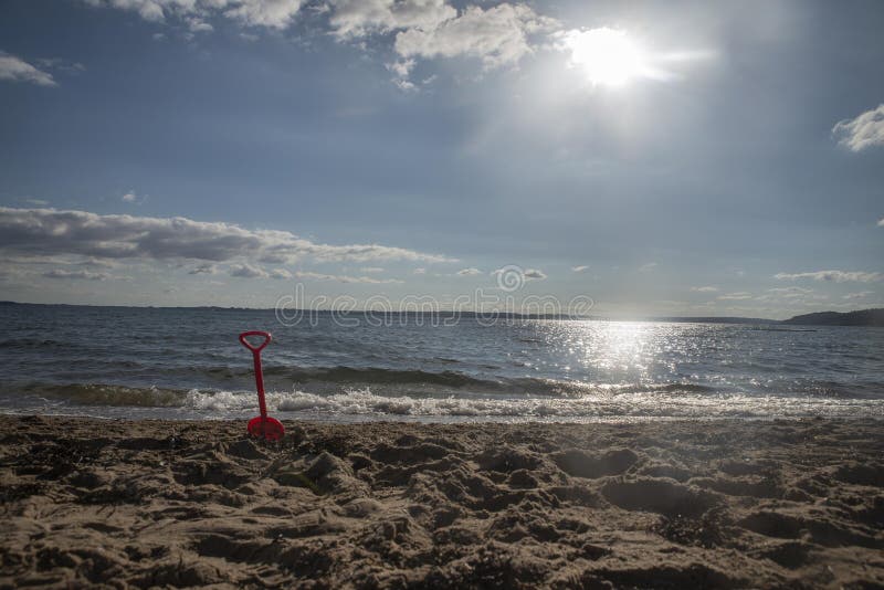 Toy Spade Left on the Beach Stock Image - Image of outdoors, summer ...