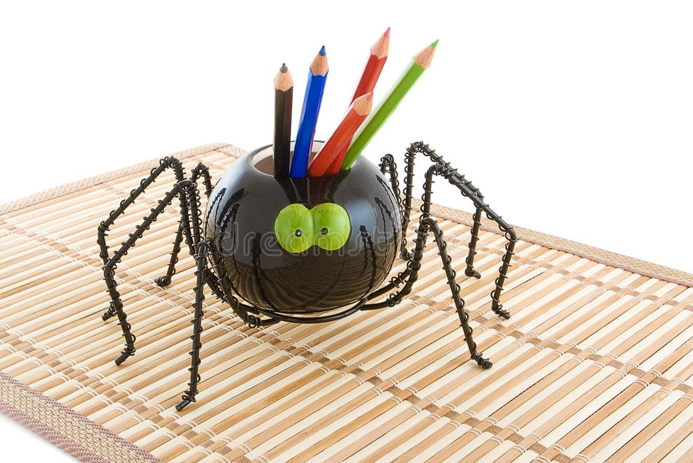 Toy spider with a pencils. stock image. Image of bamboo - 7311099