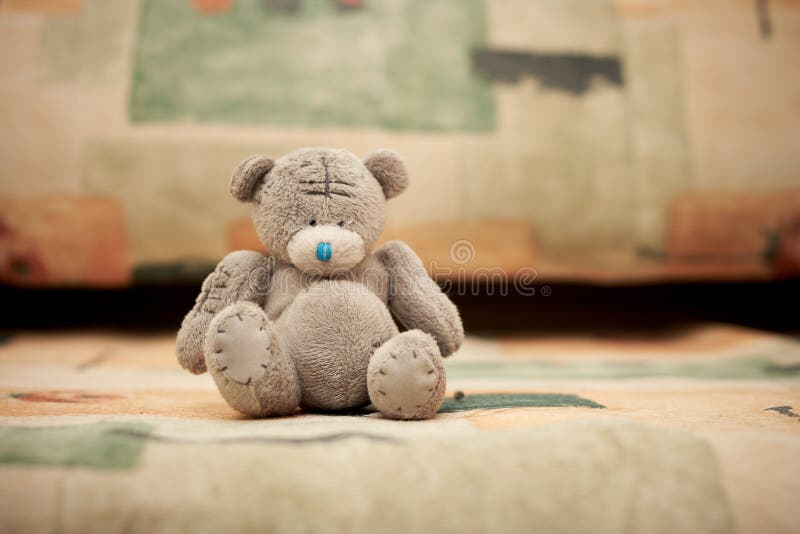 Toy Teddy Bear Sits on the Couch Stock Photo - Image of objects, color ...