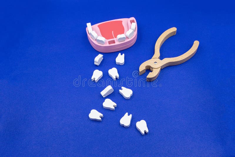 Toy Teeth on a Blue Background. Stomatologist Toy Set Stock Image ...