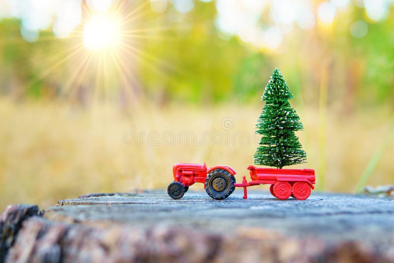 Toy Tractor with Christmas Tree and Sun Stock Image - Image of mini ...