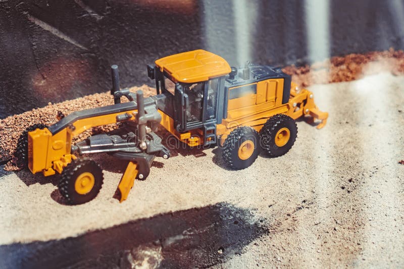 Toy Tractor in the Scenery of Coal Mining Stock Photo - Image of field ...
