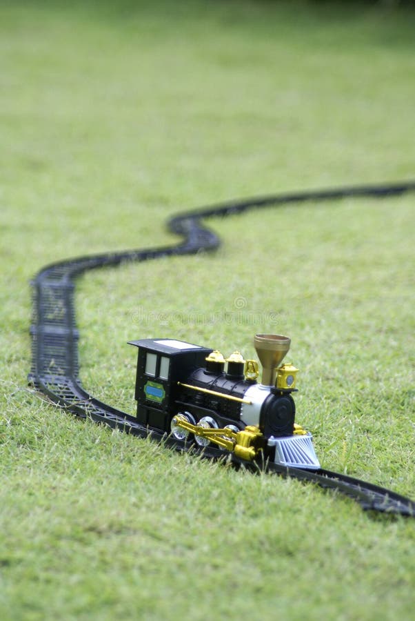 A toy train set on grass stock image. Image of hobby, locomotive - 2665245