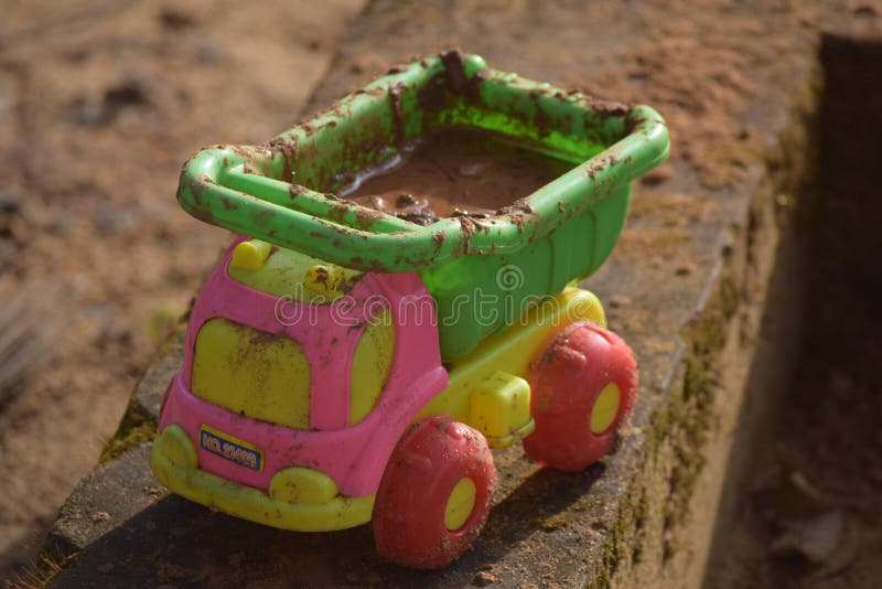 Toy truck with mud sand stock photo. Image of produce - 220041488