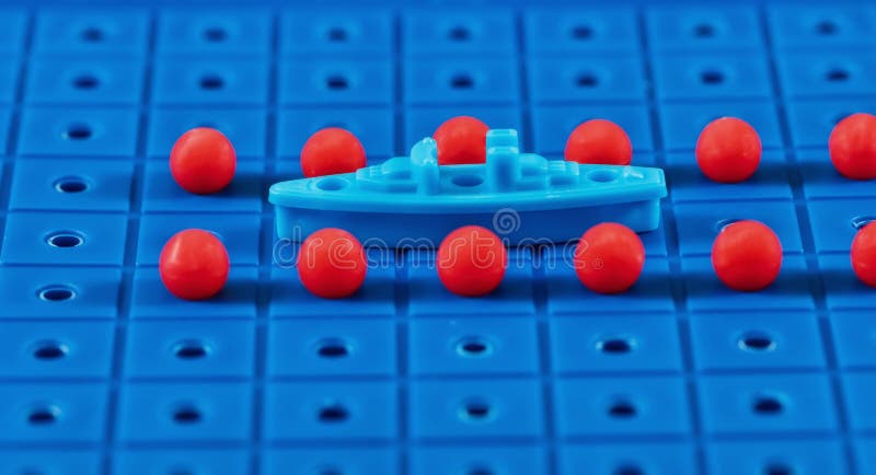 Toy War Ship Surrounded by a Corridor of Underwater Mines Stock Photo ...