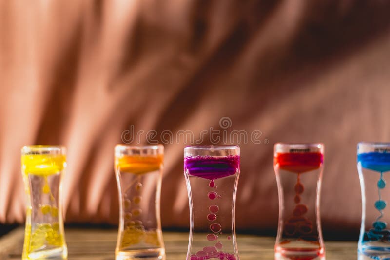 Toy with Water and Drops of Oil Colors Stock Image - Image of leak ...