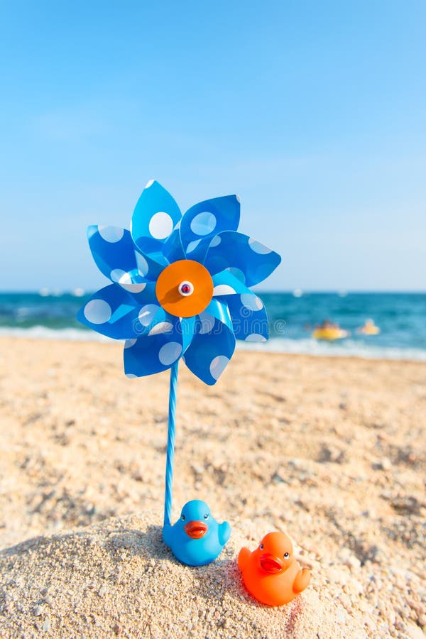Toy windmill at beach stock image. Image of beach, travel - 57146665