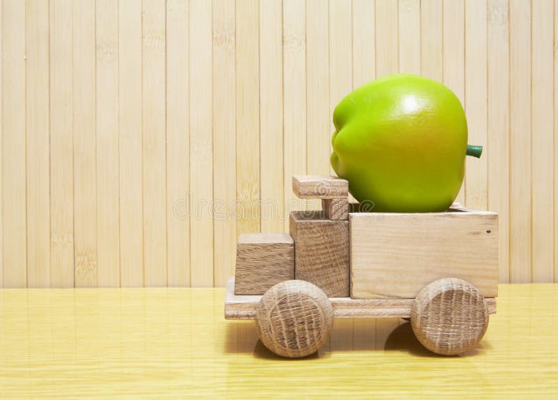 Toy Wooden Car with Green Apple Stock Image - Image of apple, lorry ...
