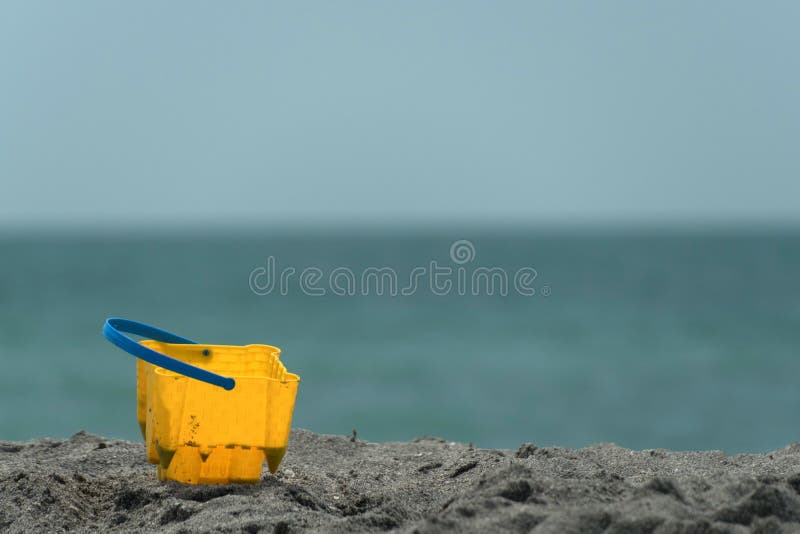 Toy Yellow Bucket at Venice Beach Stock Image - Image of mexico, jetty ...