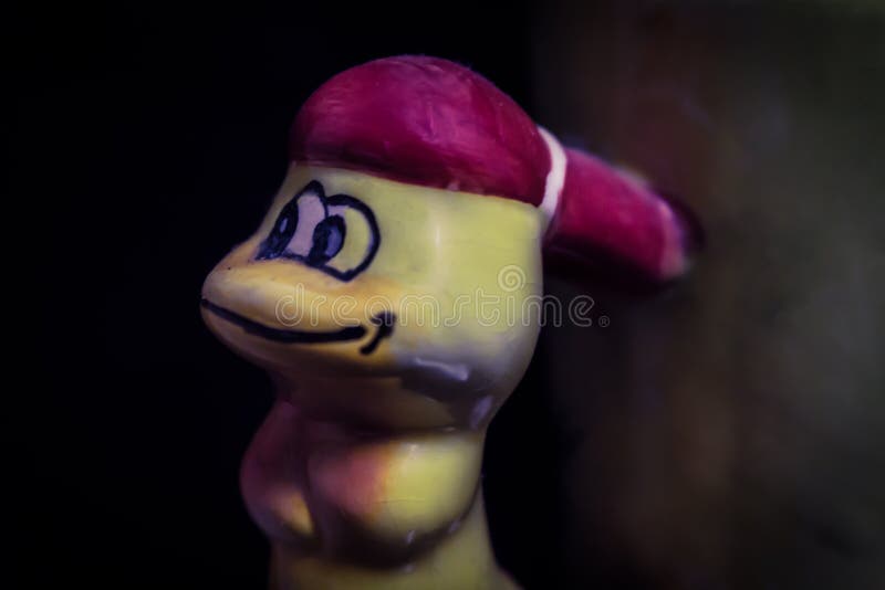 Toy yellow figure stock image. Image of artwork, smiley - 65353655