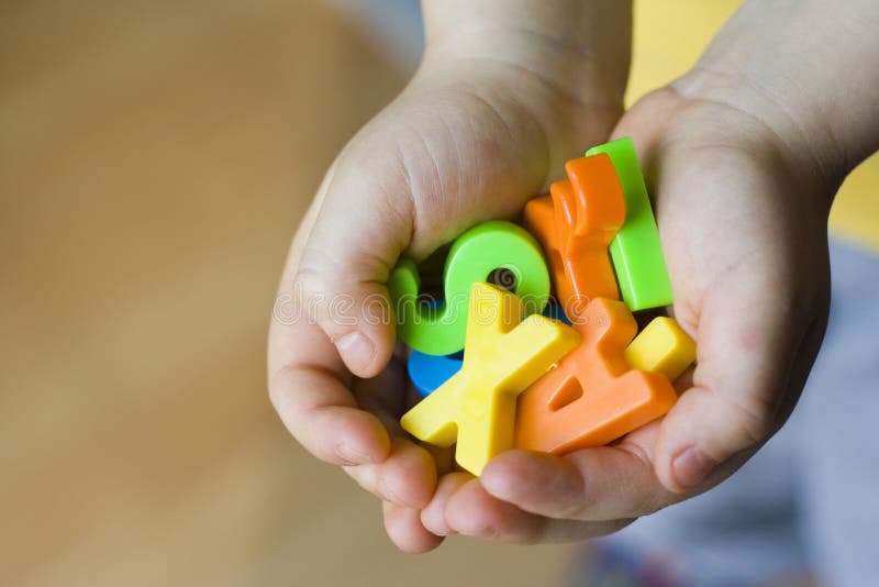 Toys in children hands stock photo. Image of little, hands - 495706