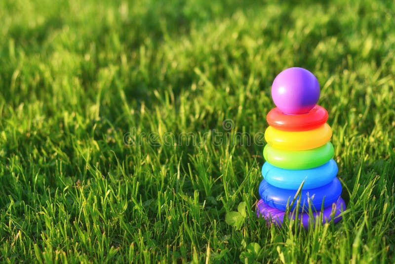 Toys on the Grass Piramid Under Sun Stock Photo - Image of organization ... Toys on the Grass Piramid Under Sun Stock Photo - Image of organization ...