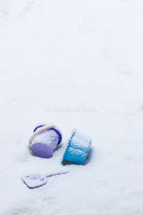 Toys Left Behind on a Snowy Ground Stock Image - Image of kids, ground ...