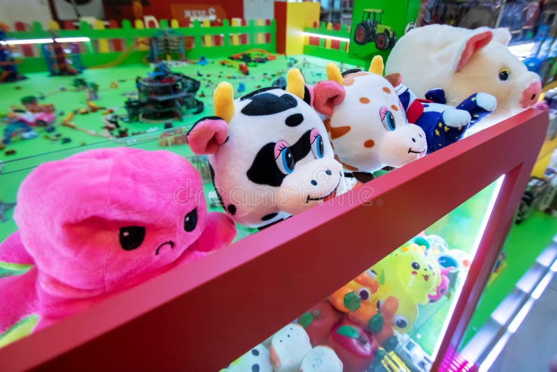 Toys pigs in a shop window stock photo. Image of autumn - 308814400