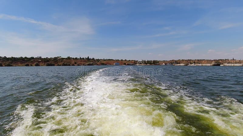 The Trace of a Boat on the Water, Which Moves Away from the Shore ...