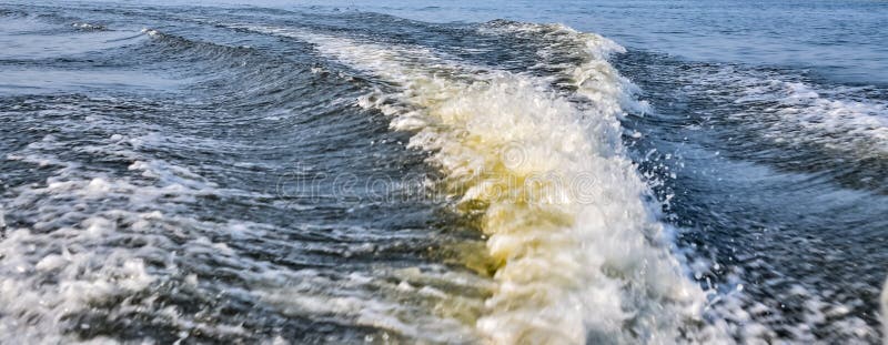 Large Waves Left on the Water by a Boat Stock Photo - Image of beauty ...