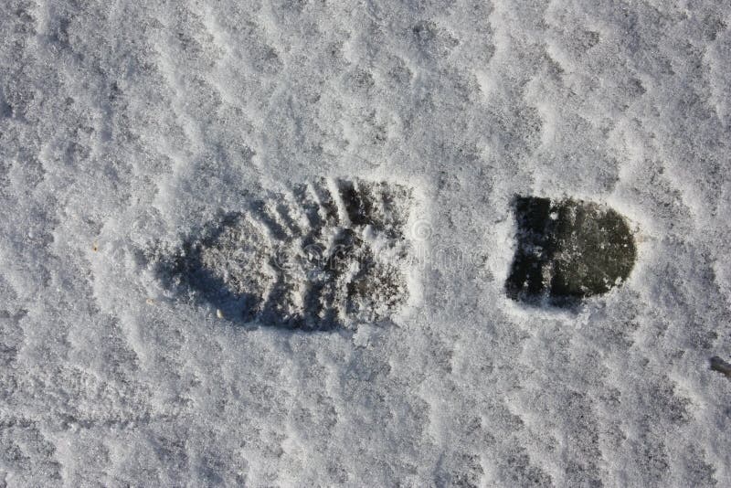 A Trace of a Human Foot in the Snow. Background Stock Photo - Image of ...