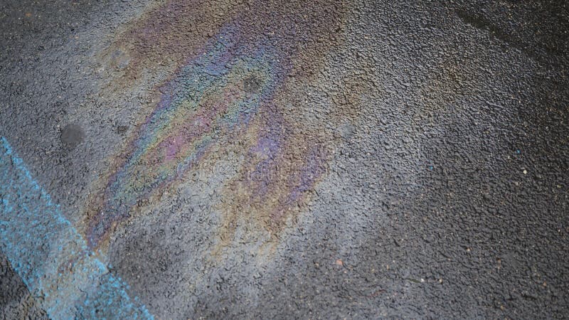 Trace of oil on asphalt stock photo. Image of blot, drawing - 109779318
