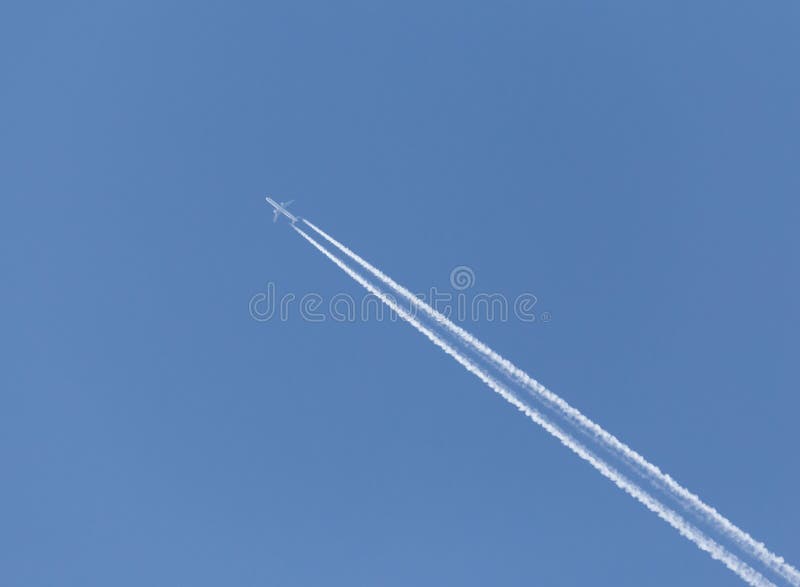 Trace from Plane in a Blue Sky Stock Image - Image of aviation, travel ...