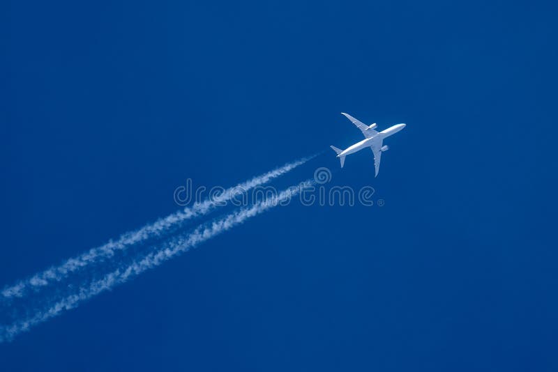 Trace from the Plane in a Blue Sunny Sky Stock Photo - Image of fluffy ...
