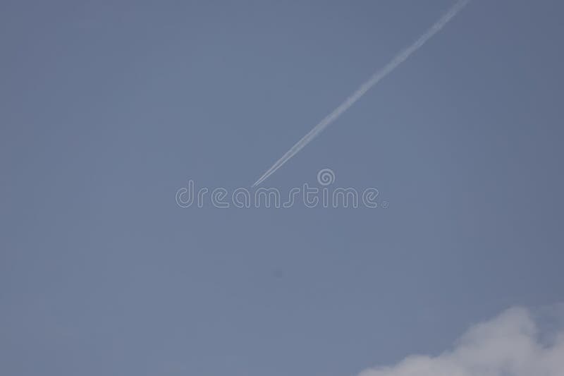 Traces of a Jet Passing in the Blue Sky Stock Photo - Image of flight ...