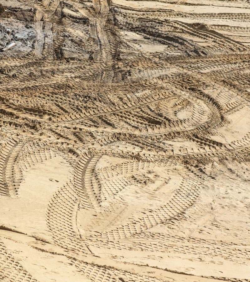 Traces from a Large Construction Vehicle on the Ground Stock Photo ...