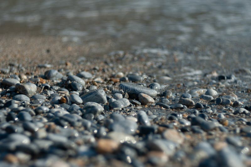 Tracing Stones on the Beach Near the Sea Stock Photo - Image of balance ...
