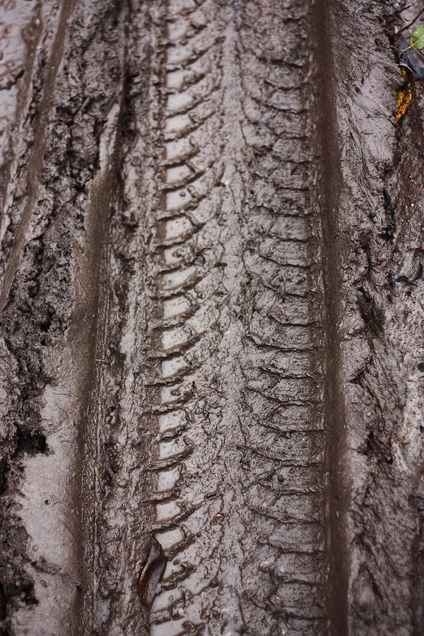 Track from a Car Wheel on the Road View Stock Image - Image of puddle ...