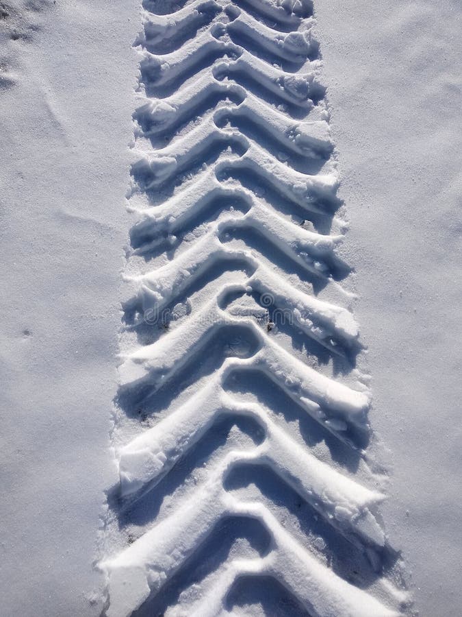 Car Wheel Track on Snowy Road Stock Photo - Image of cold, snowy: 143140392