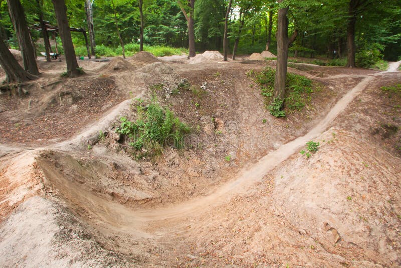 Track for Dirt Jumping on Bikes at the Forest Stock Photo - Image of ...