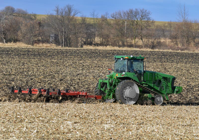 Track Drive Tractor Pulling a Disk Chisel Plow Stock Photo - Image of ...