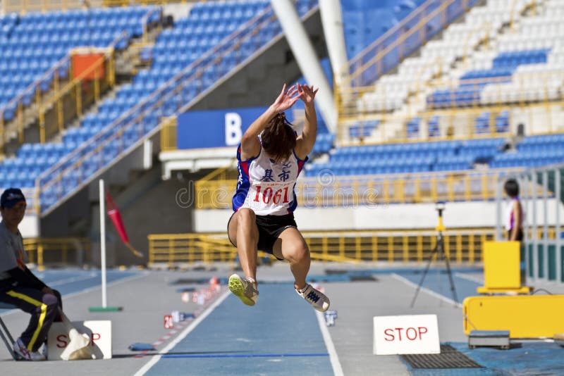 Female Athlete Makes Long Jump Editorial Photography - Image of ...