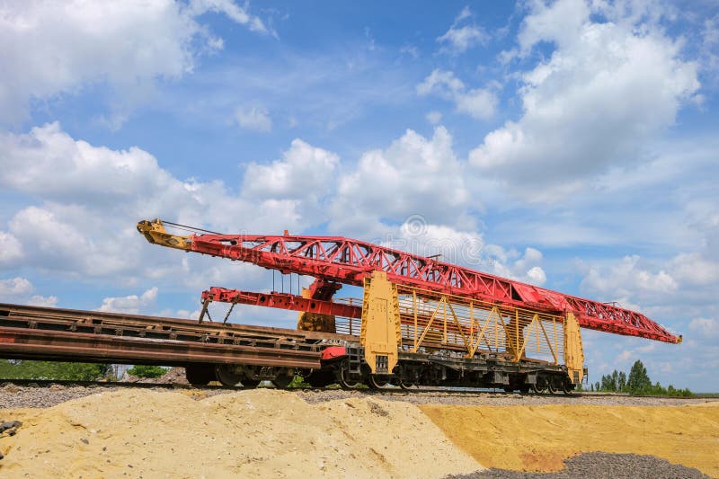 Track Layer for Transporting and Laying Rail and Sleeper Grids on ... Track Layer for Transporting and Laying Rail and Sleeper Grids on ...