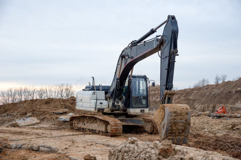 Track-type Excavator during Earthmoving Works at Open-pit Mining ...