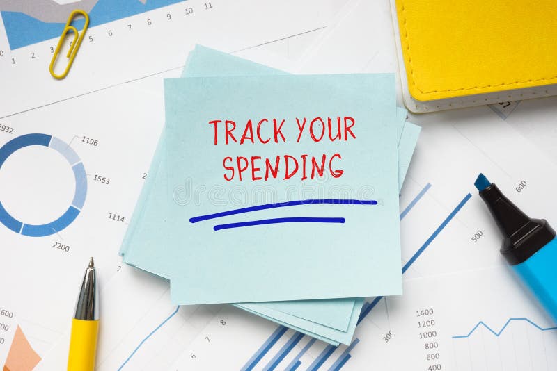 TRACK YOUR SPENDING Sign on the Sheet Stock Photo - Image of sale ...