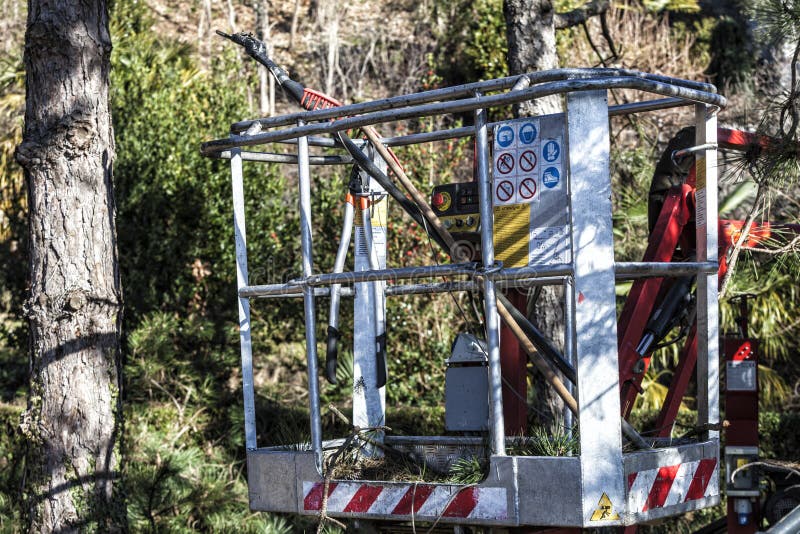 A Tracked Basket for Gardeners. Mobile Aerial Work Platform Editorial ...