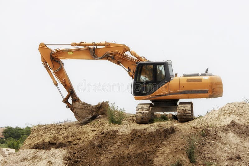 Tracked excavator stock image. Image of yellow, power - 56927915