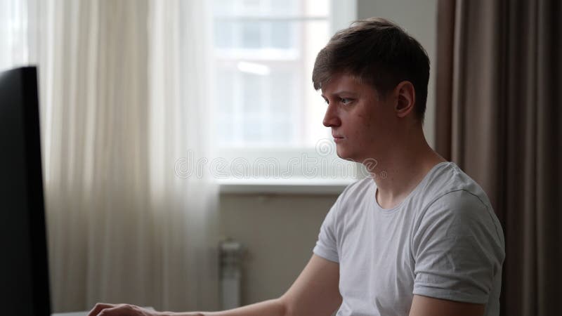 Tracking Shot of Focused Freelancer Male Typing on Keyboard Doing ...