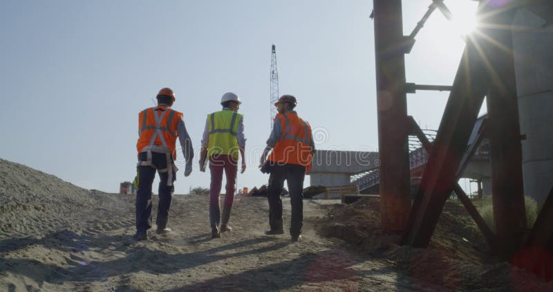 Inspectors Walking on Bridge Construction Site Stock Image - Image of ...