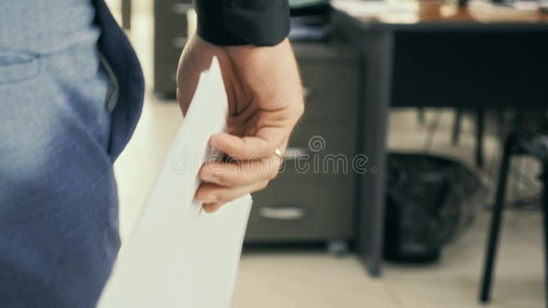 Tracking Shot of Office Worker Walking with Documents in His Hand Stock ...