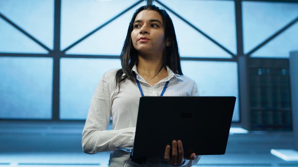 Tracking Shot of Woman in Server Hub Ensuring Networks are Secure Stock Photo - Image of ...