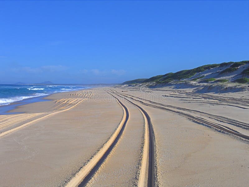 Tracks on a beach stock image. Image of tire, road, blue - 4947813