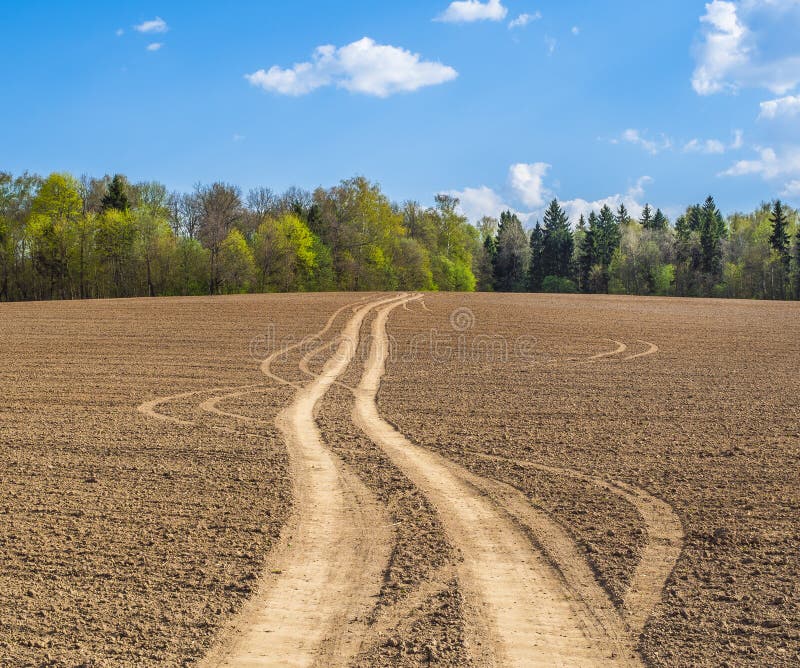 Tracks on the field stock photo. Image of road, farm - 94445450