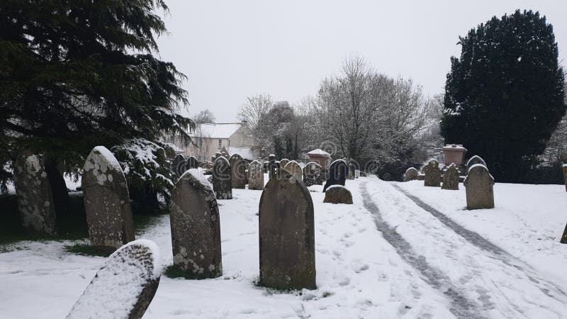 Tracks in a cold graveyard stock photo. Image of freezing - 271531858