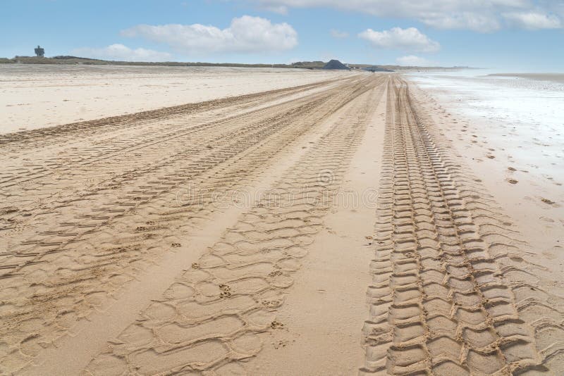 Tracks in the sand stock image. Image of truck, land - 270500327