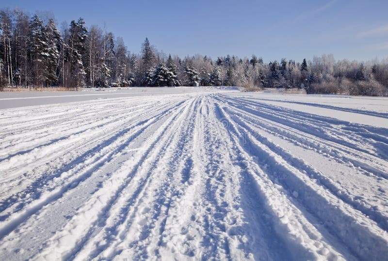 Tracks on snow stock image. Image of frost, frozen, road - 80398659