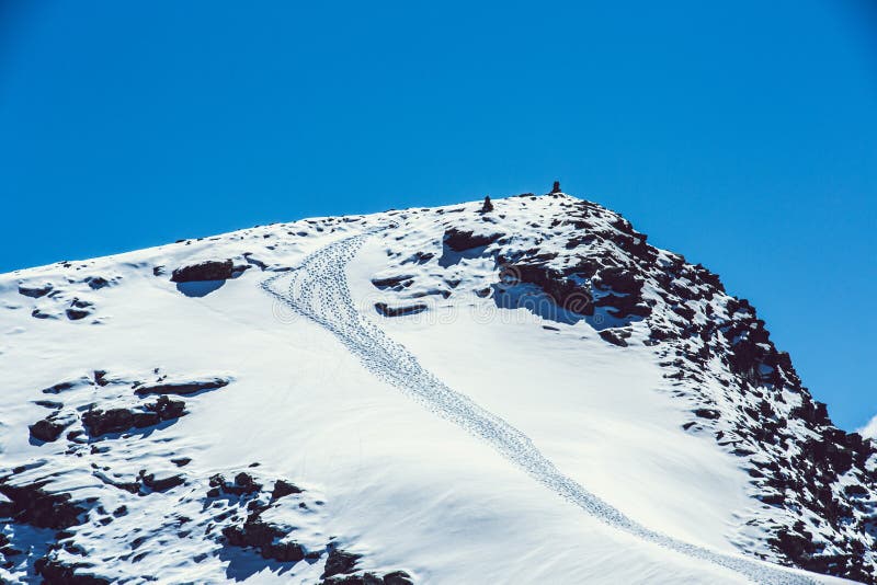 Tracks in the snow stock photo. Image of beautiful, mountain - 72025270